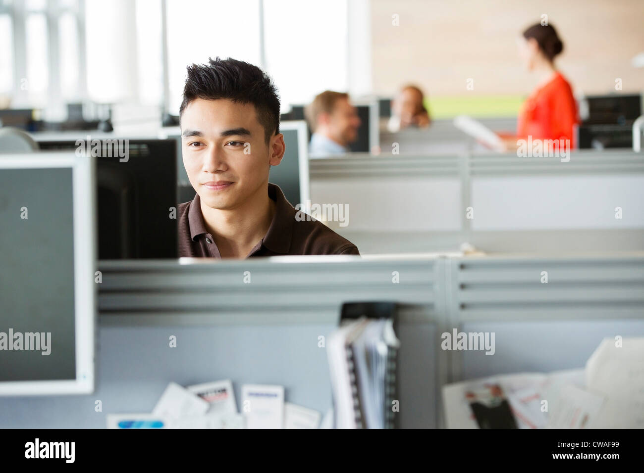 Young man working in office Stock Photo - Alamy