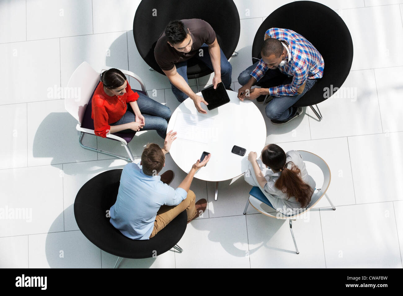 Aerial view people sitting around hi-res stock photography and images ...