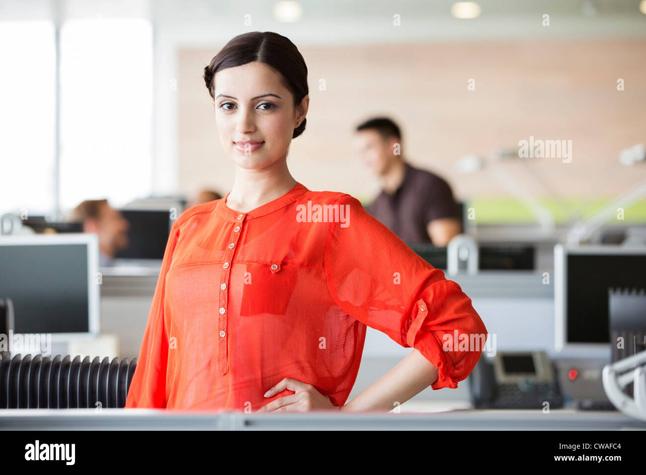 Businesswoman in office Stock Photo - Alamy