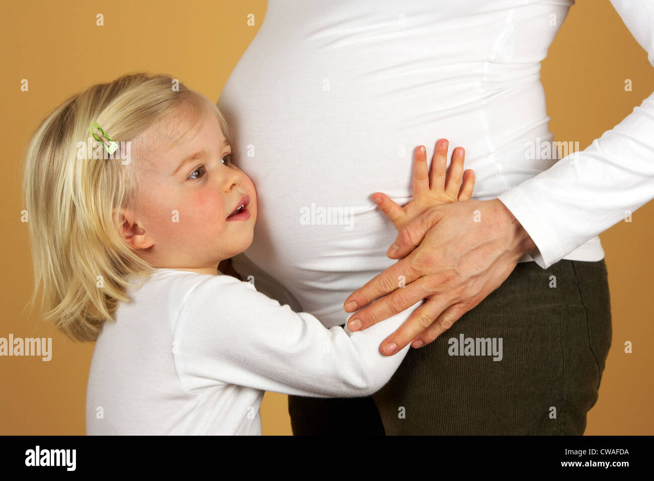 Child with pregnant baby bump Stock Photo - Alamy