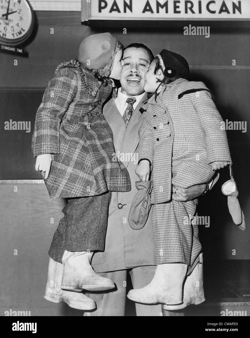 Cab Calloway (1907-1994), greeted by his daughters, Chris and Lael, at ...