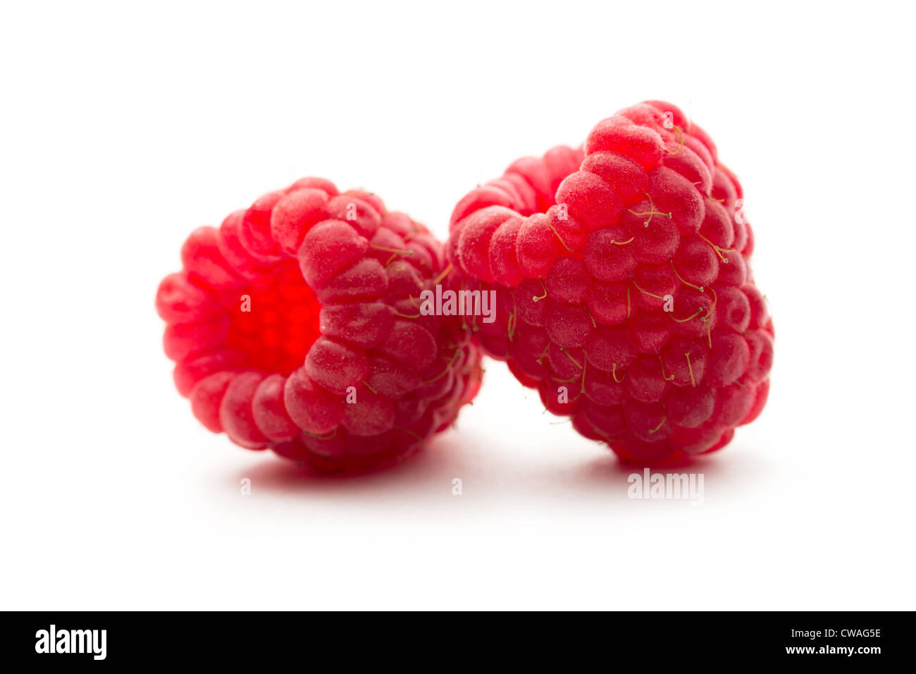 Fresh raspberry on white background Stock Photo - Alamy