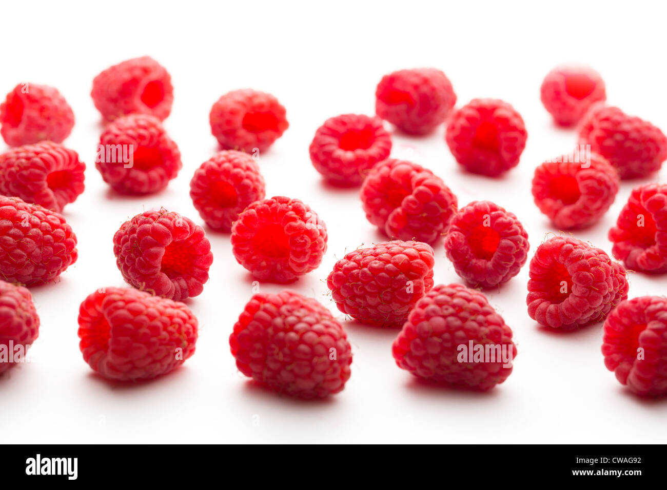 Fresh raspberry on white background Stock Photo - Alamy