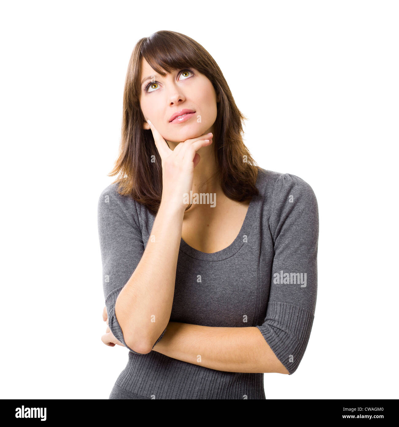 Portrait of a beautiful young woman thinking, isolated on white ...