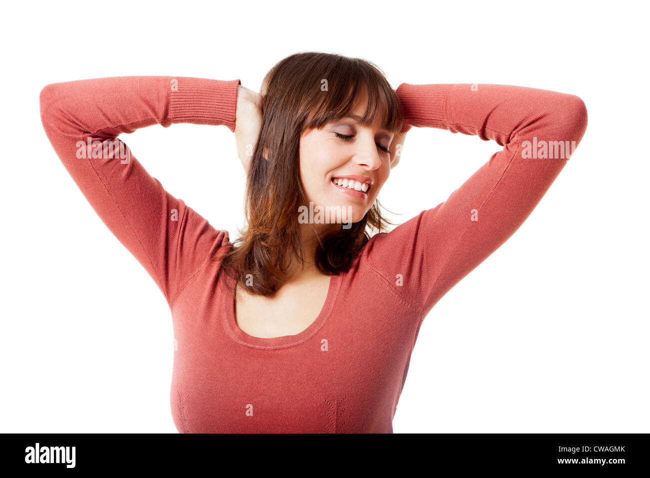 Beautiful woman relaxed and smiling, isolated on a white background ...