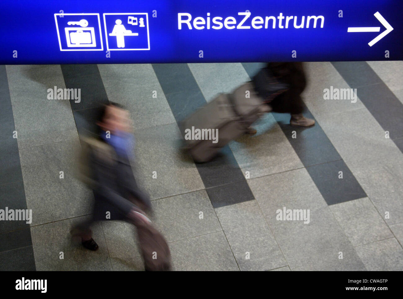 Passersby in the center of the Deutsche Bahn travel Stock Photo - Alamy