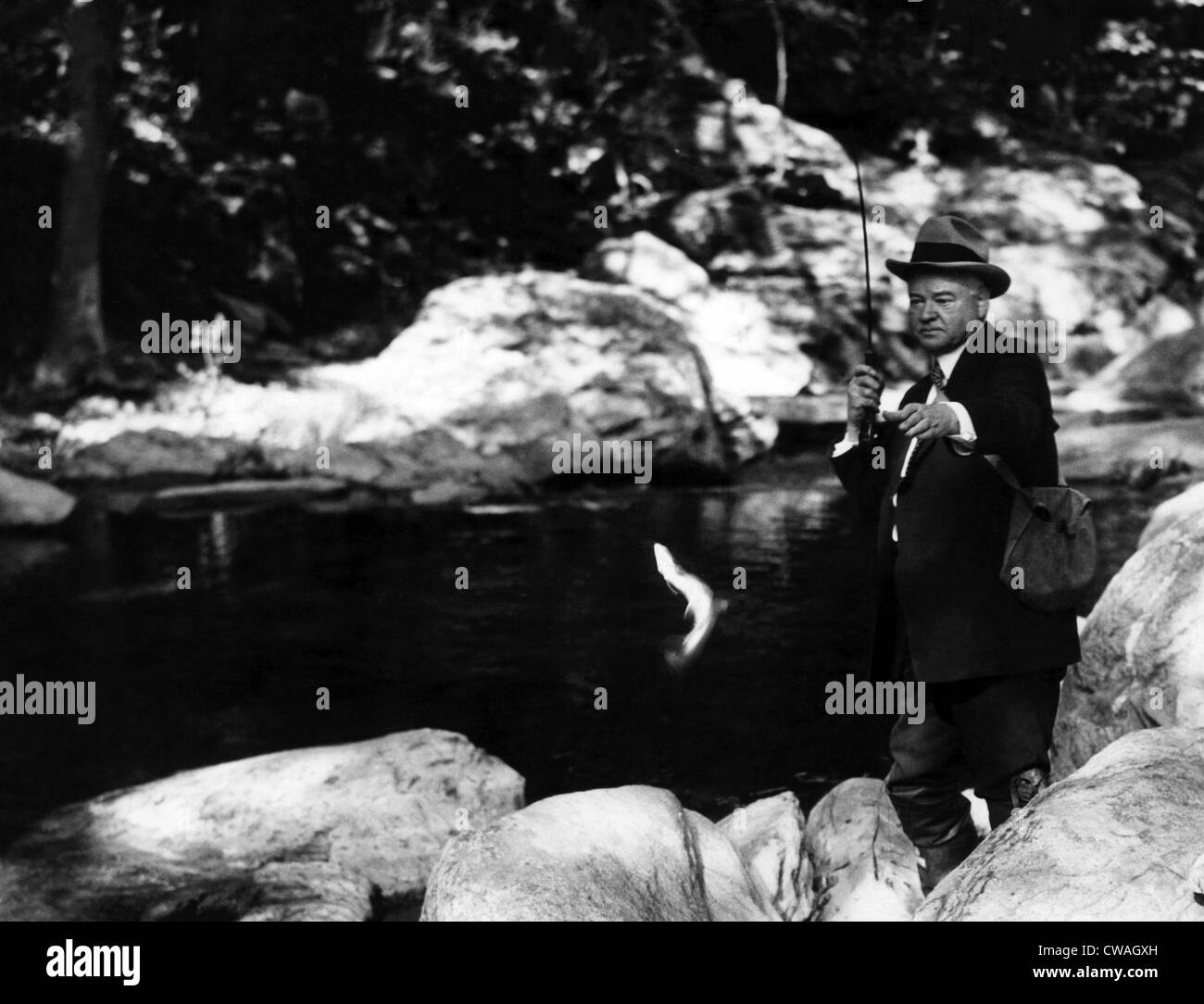 Former president Herbert Hoover, trout fishing in the stream on former ...
