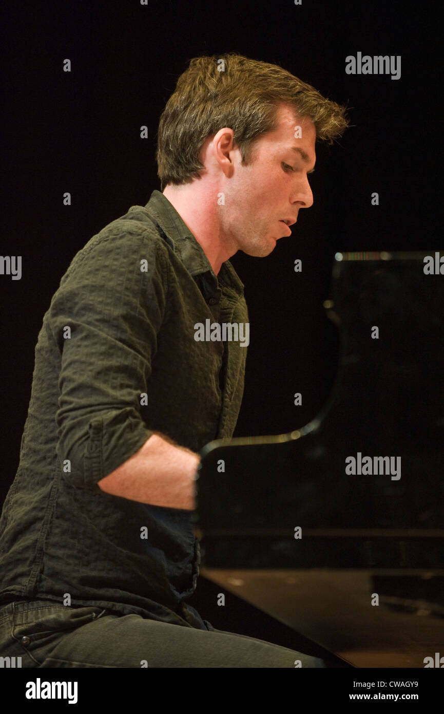 Jazz pianist Gwilym Simcock playing with the LIGHTHOUSE trio performing ...