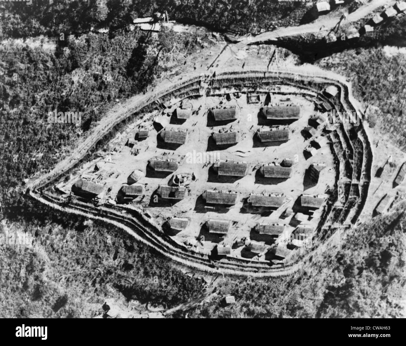Aerial view of a "strategic hamlet", houses surrounded by barricades ...