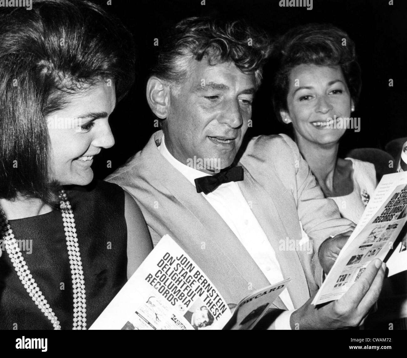 Jacqueline Kennedy, Leonard Bernstein and Shirley Bernstein look at ...