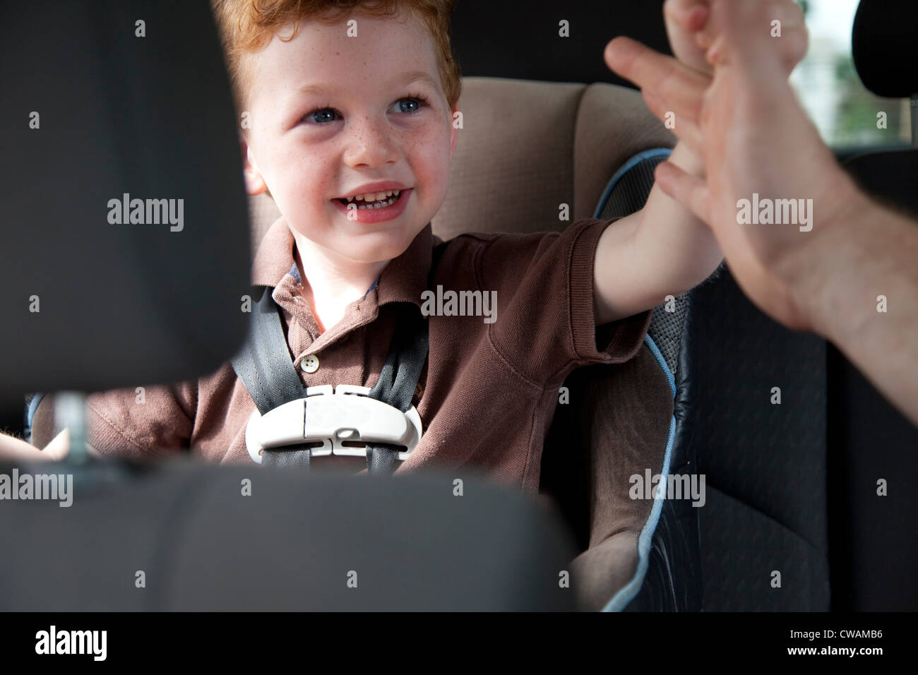 Boy reaching out hand High Resolution Stock Photography and Images - Alamy