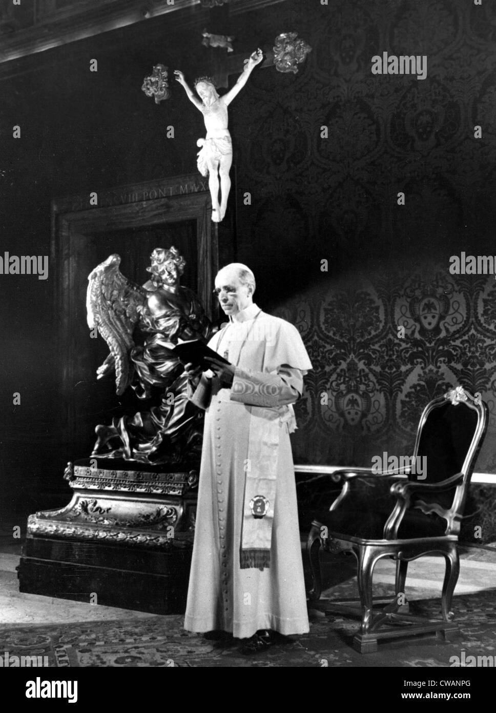 POPE PIUS XII, 1950.Filmed for television reading prayer book for Holy ...