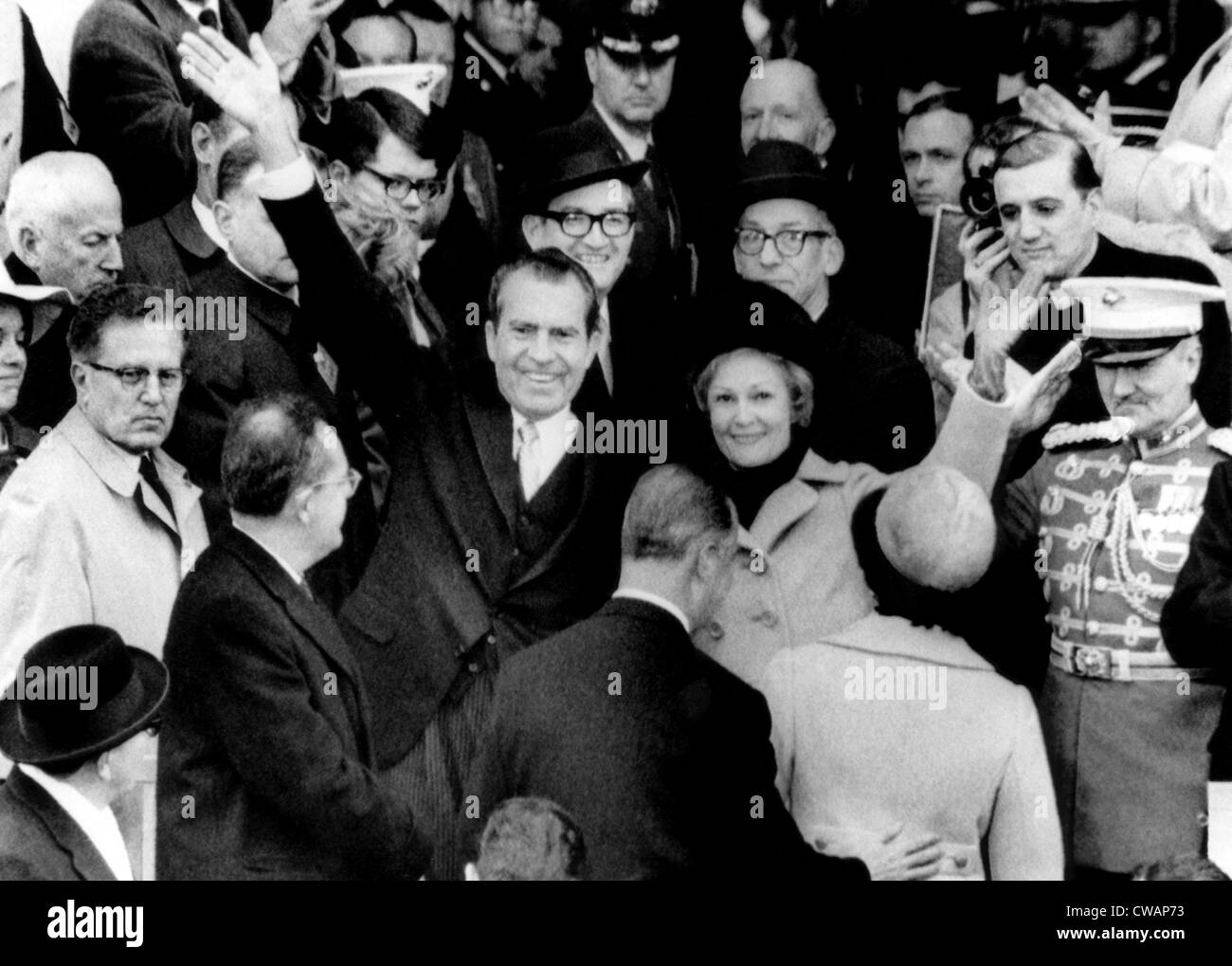 center, waving: U.S. President Richard Nixon, First Lady Pat Nixon ...