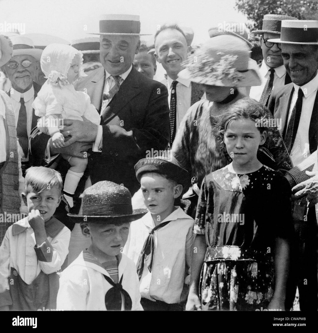 Warren G. Harding (1865-1923), holds the baby and talks to the farmers ...