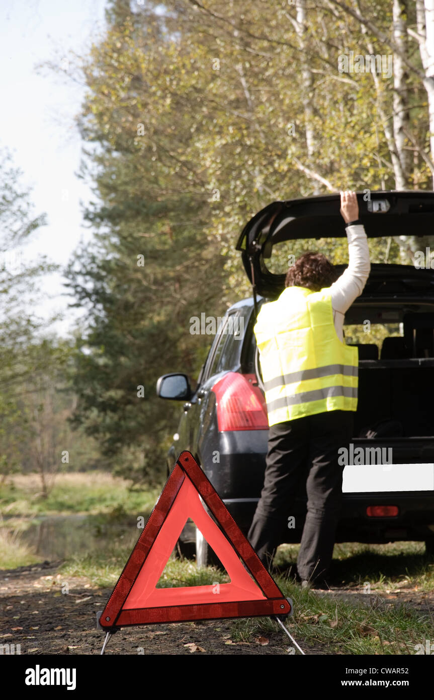 Car breakdown and red triangle Stock Photo - Alamy