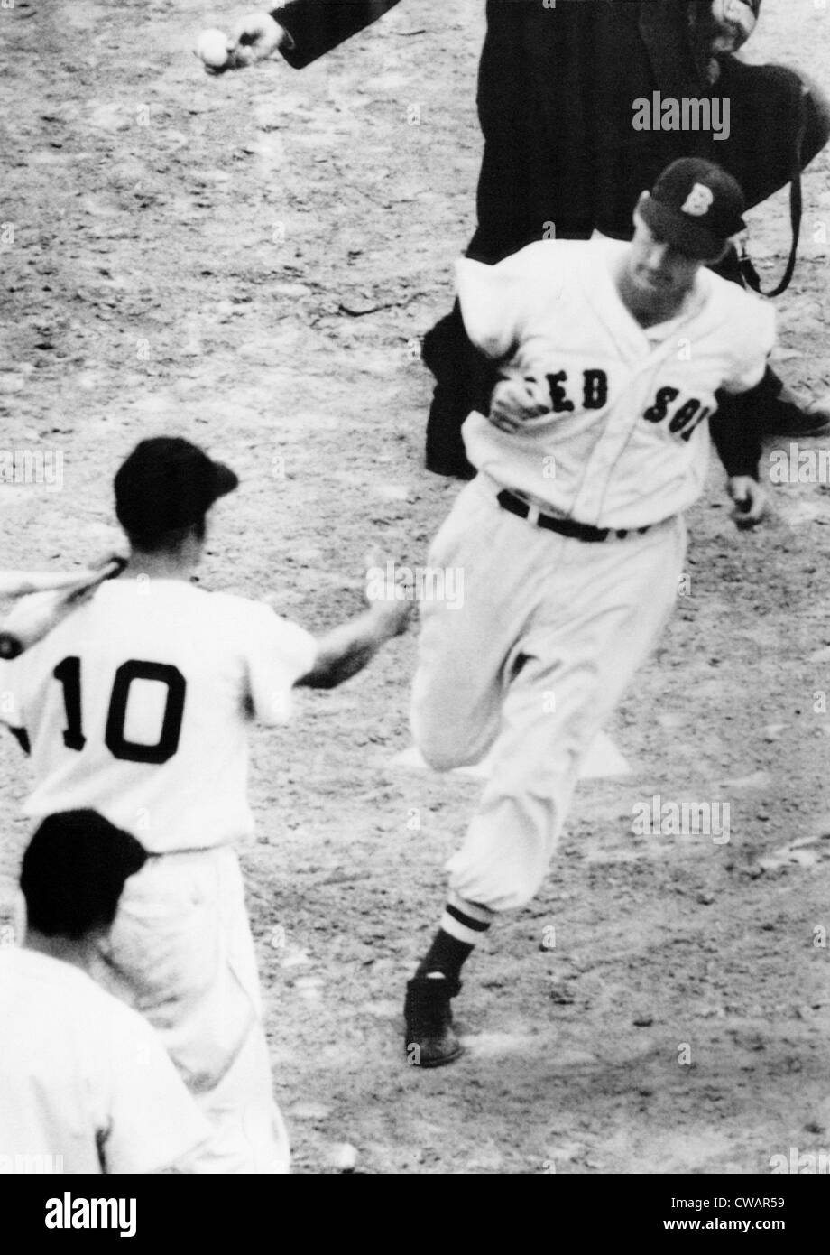 Ted Williams of the Boston Red Sox, scoring his 325th career home run ...