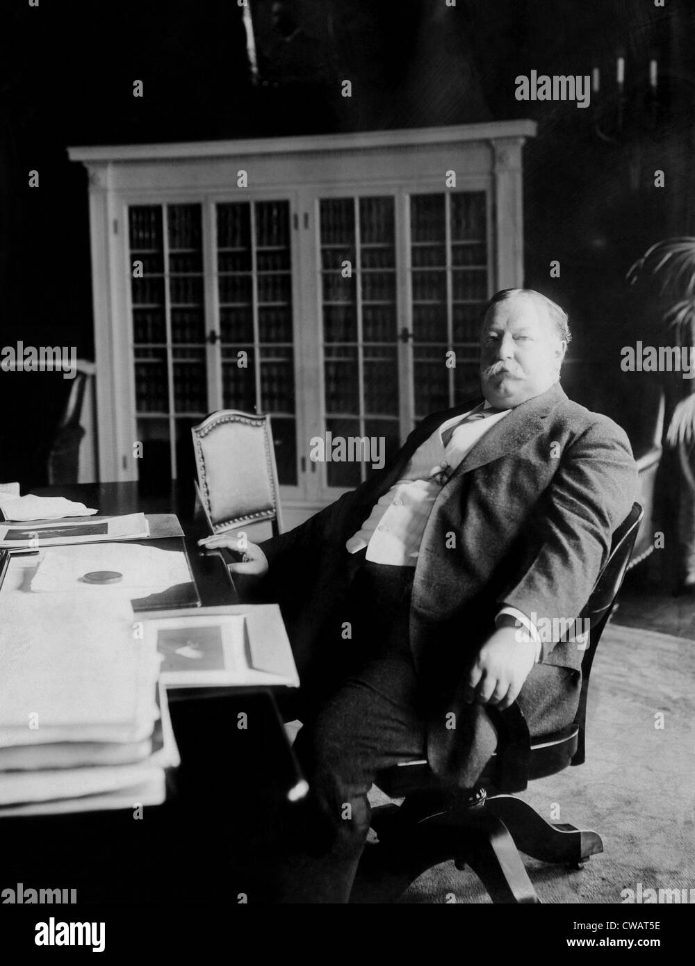 William Taft, (1857-1930), U.S. President 1909-1913, at his desk in the ...