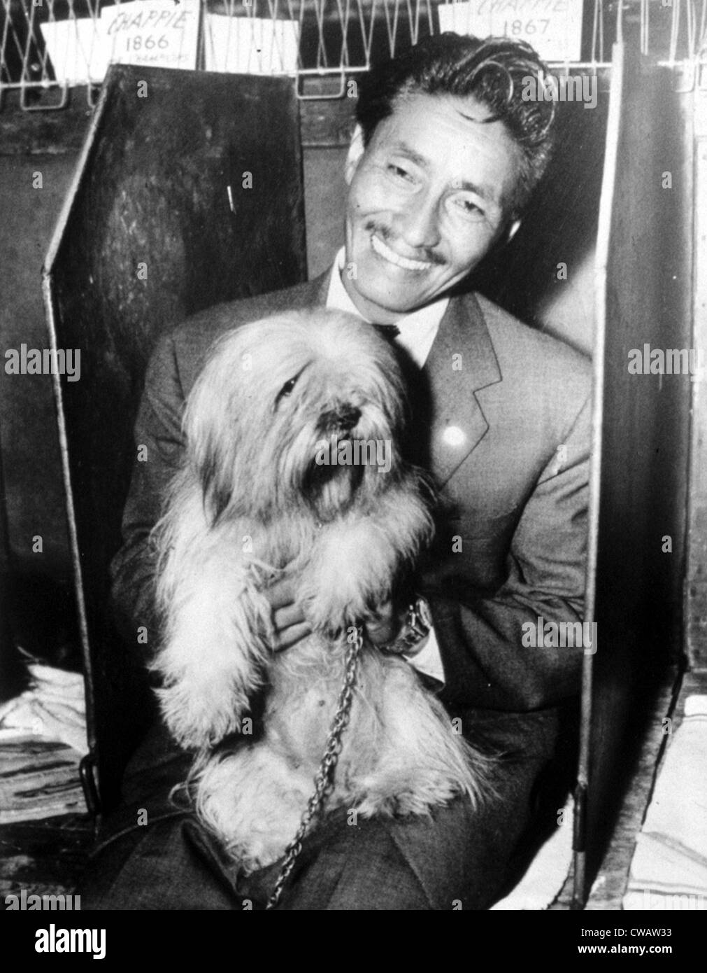 Tensing Norkay with his dog, at a dog show, 11/1/57. Courtesy: CSU ...