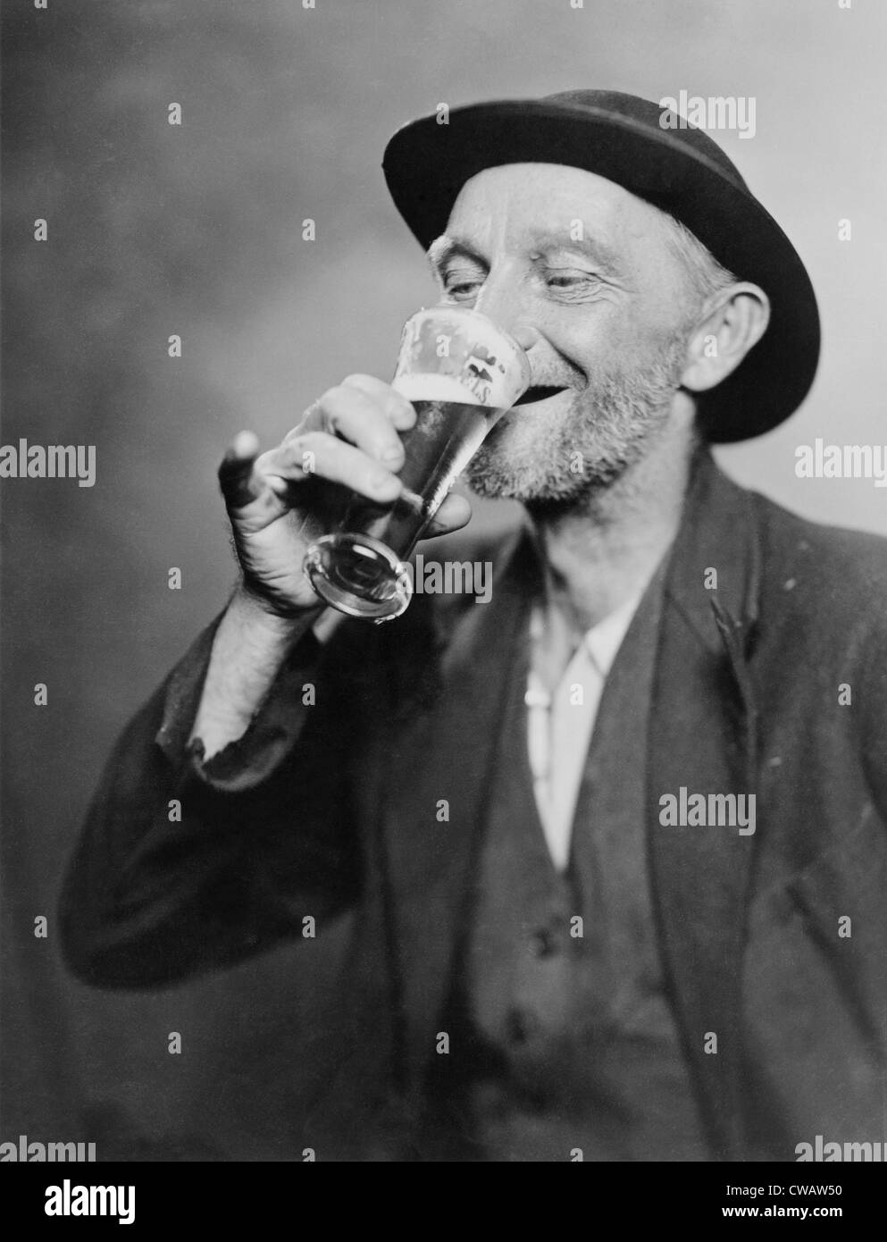 Old man drinking beer Black and White Stock Photos & Images - Alamy