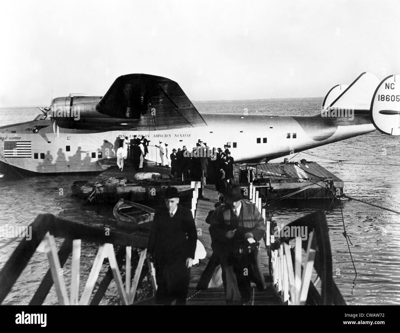 Passengers disembarking the first commercial cross-Atlantic flight, Pan ...