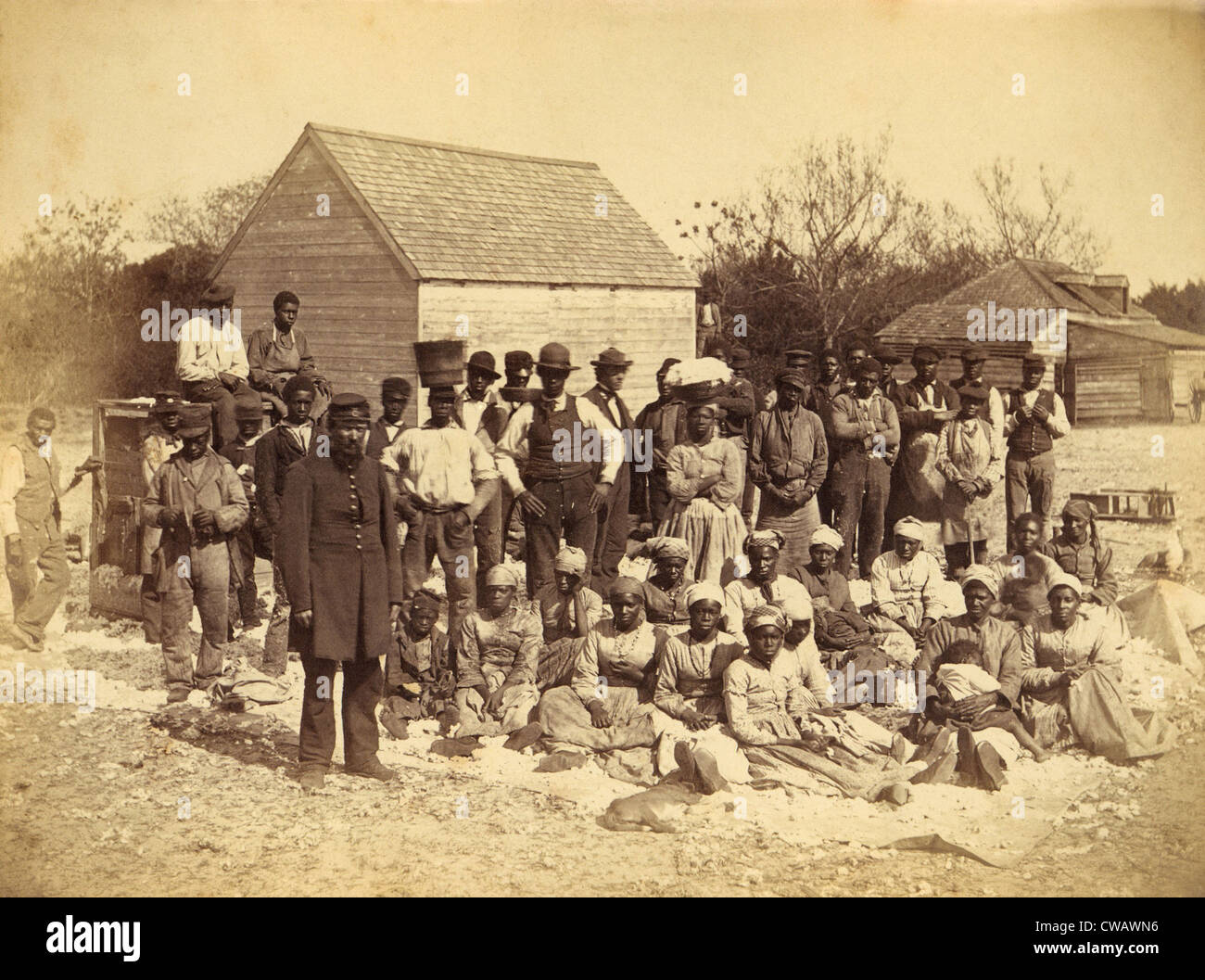 A Union soldier stands with African Americans on the plantation Thomas ...
