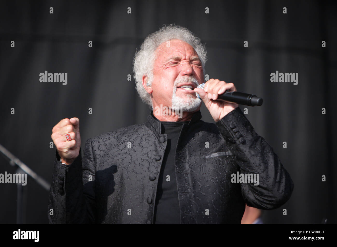 Sir Tom Jones performing live on stage at V Festival in Hylands Park ...