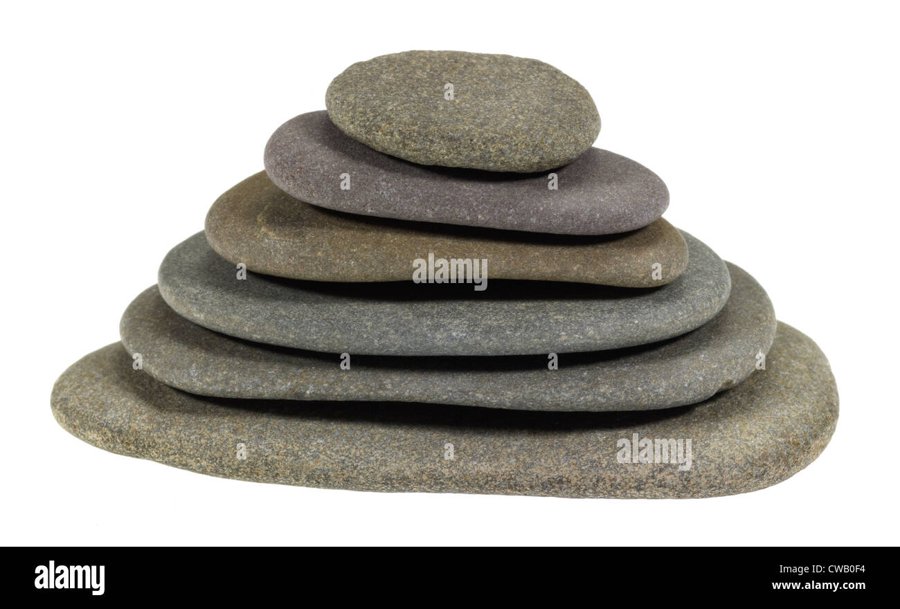 a flat pebble stone stack in light back Stock Photo - Alamy