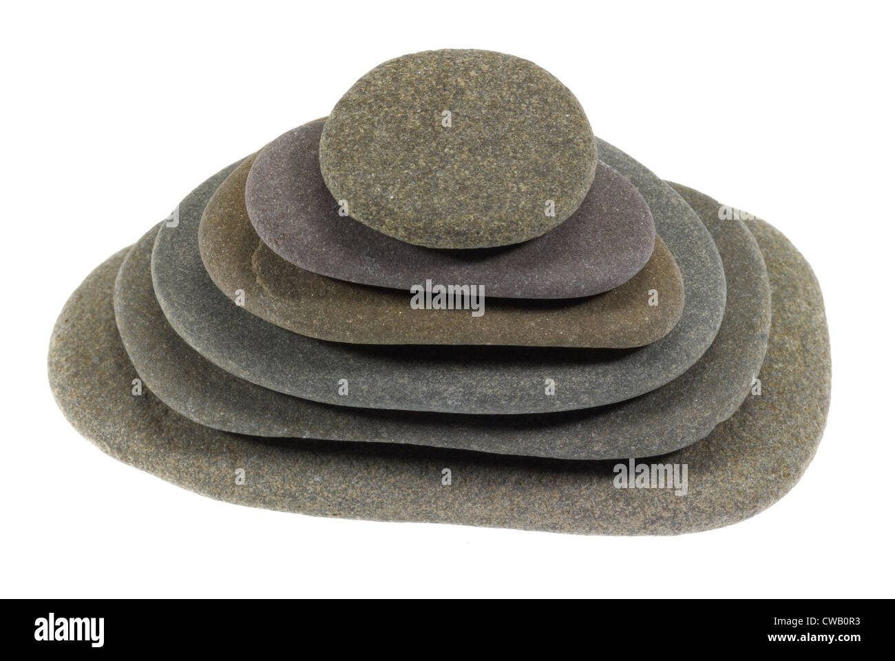 a flat pebble stone stack in light back Stock Photo - Alamy