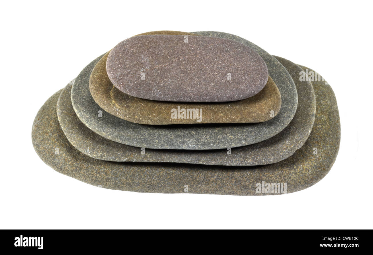 a flat pebble stone stack in light back Stock Photo - Alamy