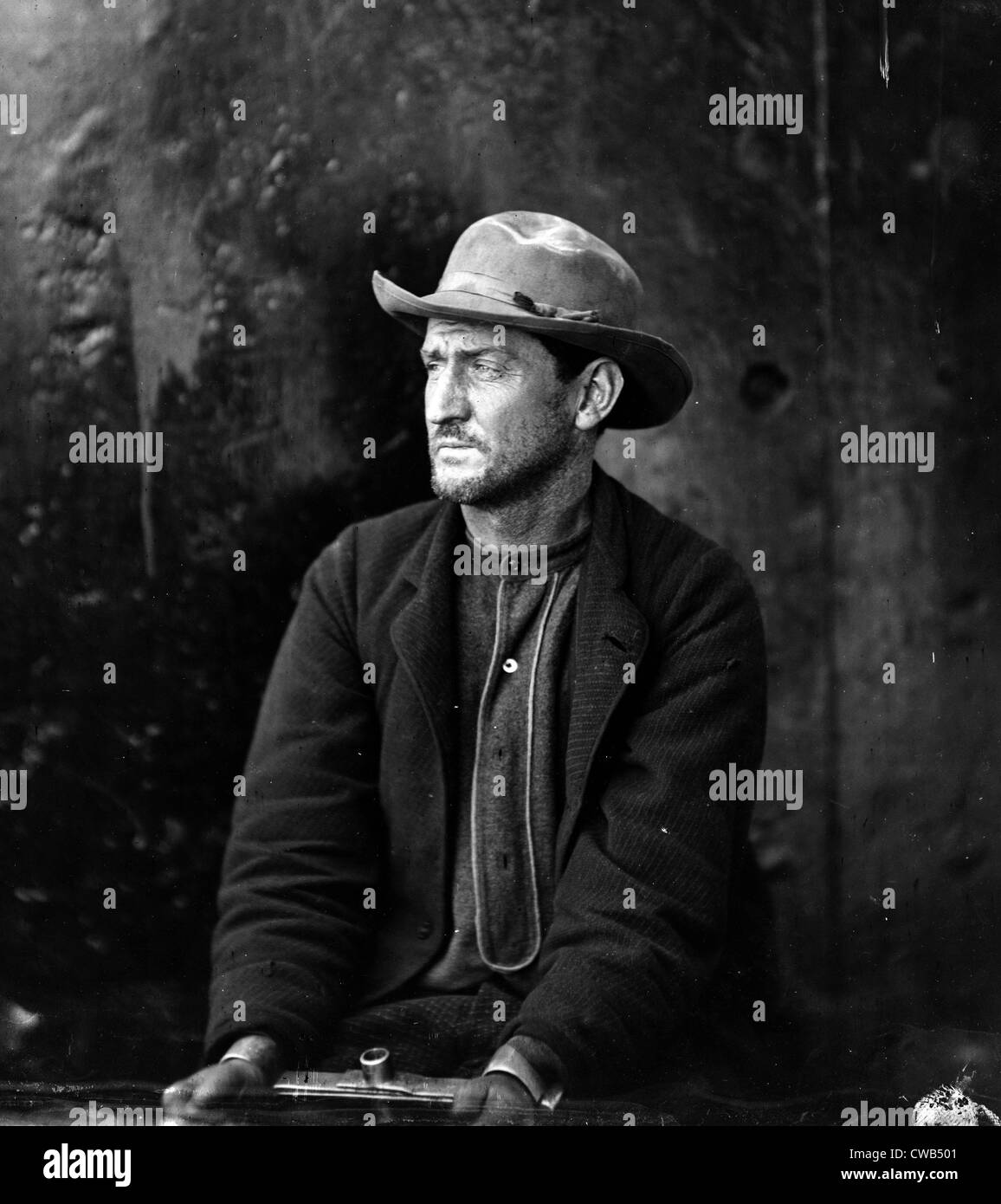 Assassins. Edman Spangler, a "conspirator," in hat and manacled ...