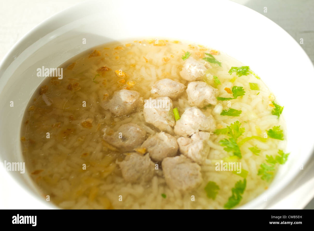 Traditional Thailand porridge rice gruel in bowl on isolated white wood ...