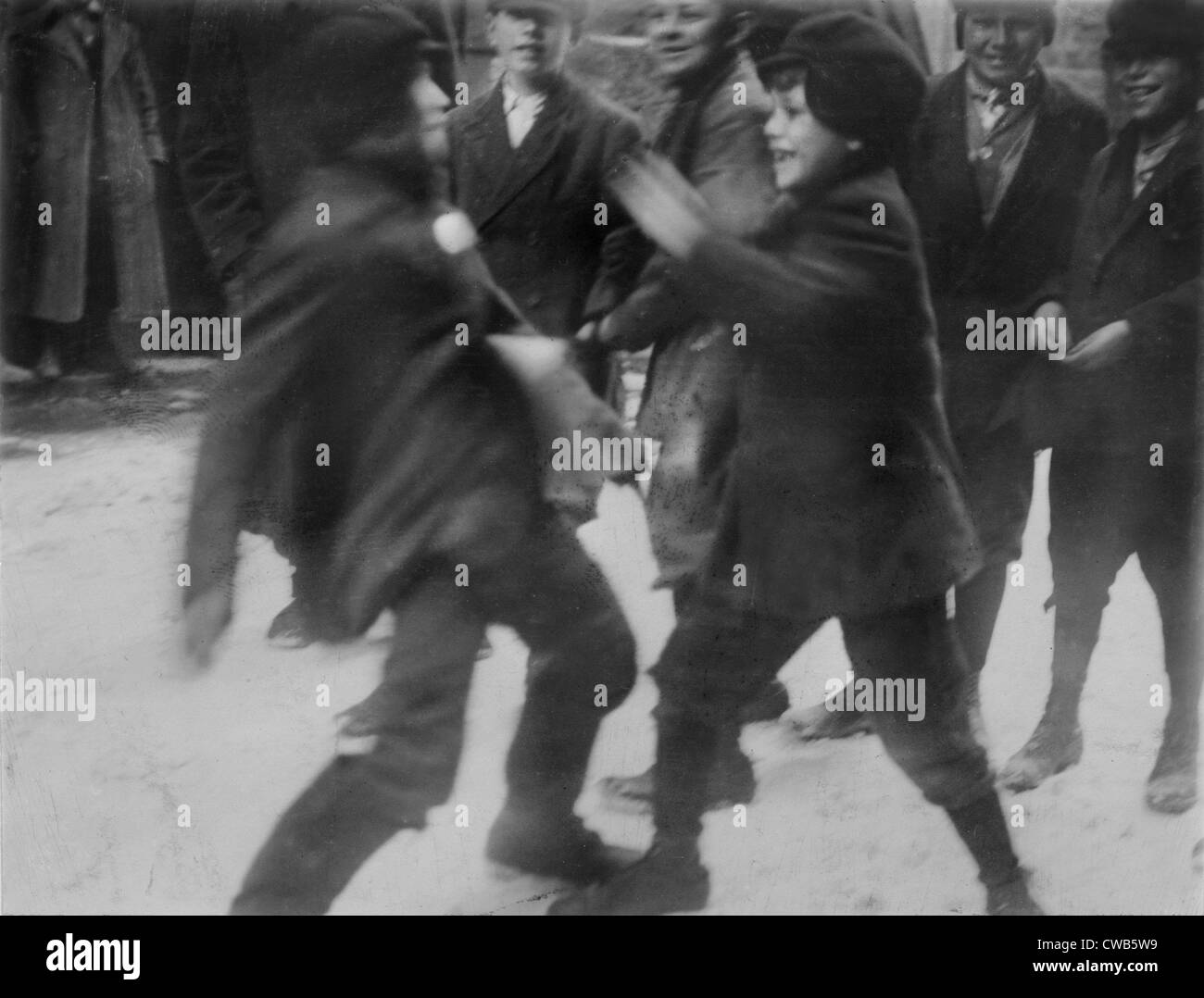 Two boys fighting, original caption: 'Fighting is not unusual here. In ...