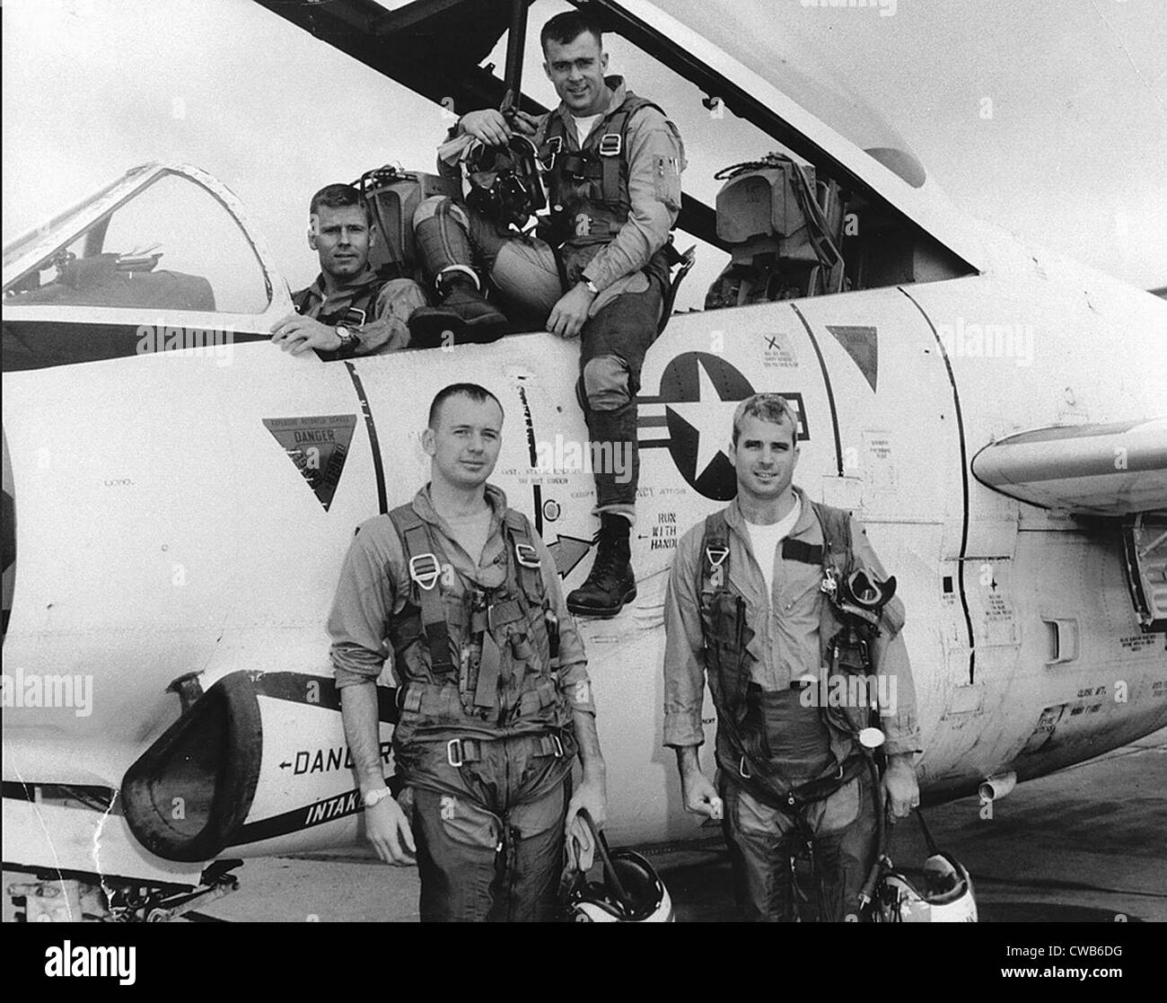 Lieutenant Commander John S. McCain, (front, right) with his squadron ...