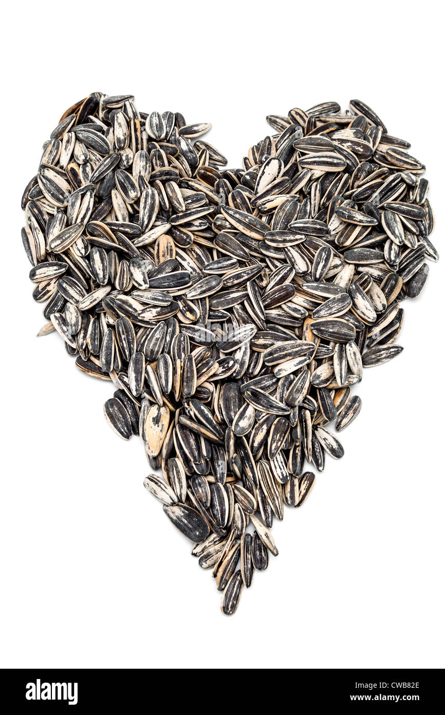 A heart made by lot of sunflower seeds Stock Photo - Alamy