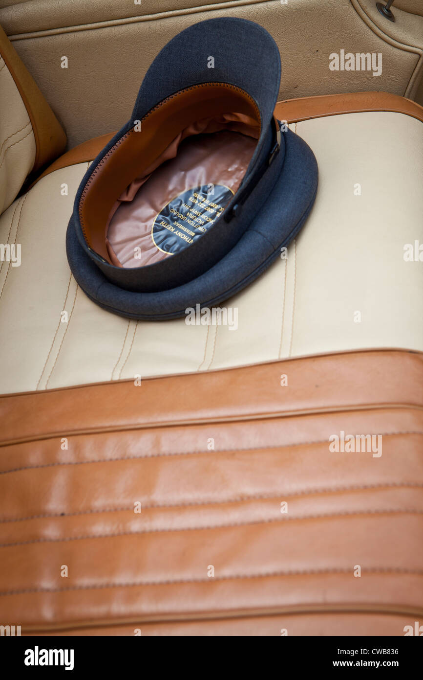 Chauffeurs hat on back seat of car Stock Photo - Alamy