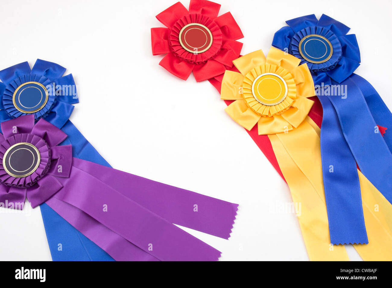 Colorful award ribbons on white background Stock Photo - Alamy