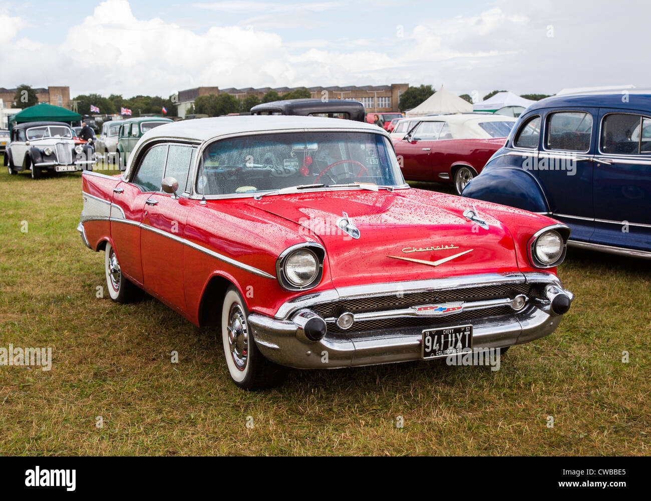 Red Chevrolet at enthusiasts' rally in Cirencester, Wiltshire, England ...