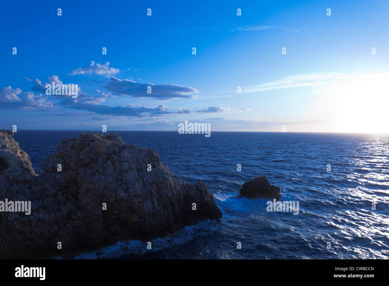 Sunset at Lighthouse Menorca Punta Nati Stock Photo - Alamy