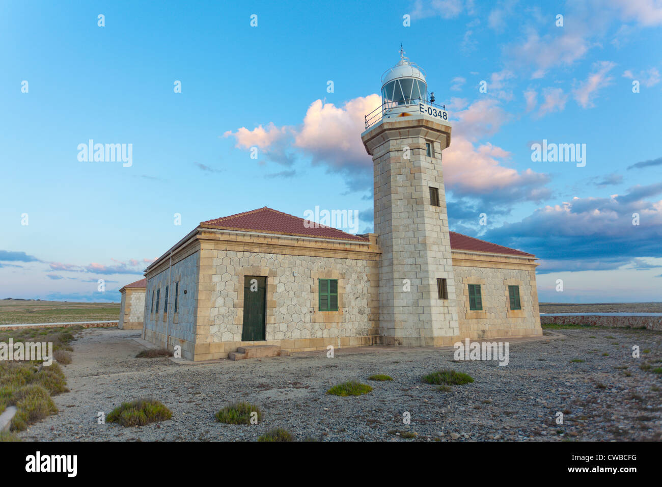 Sunset at Lighthouse Menorca Punta Nati Stock Photo - Alamy