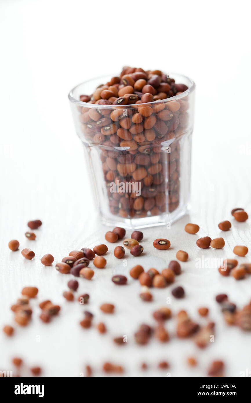 Close-up of dry uncooked beans in a glass Stock Photo - Alamy