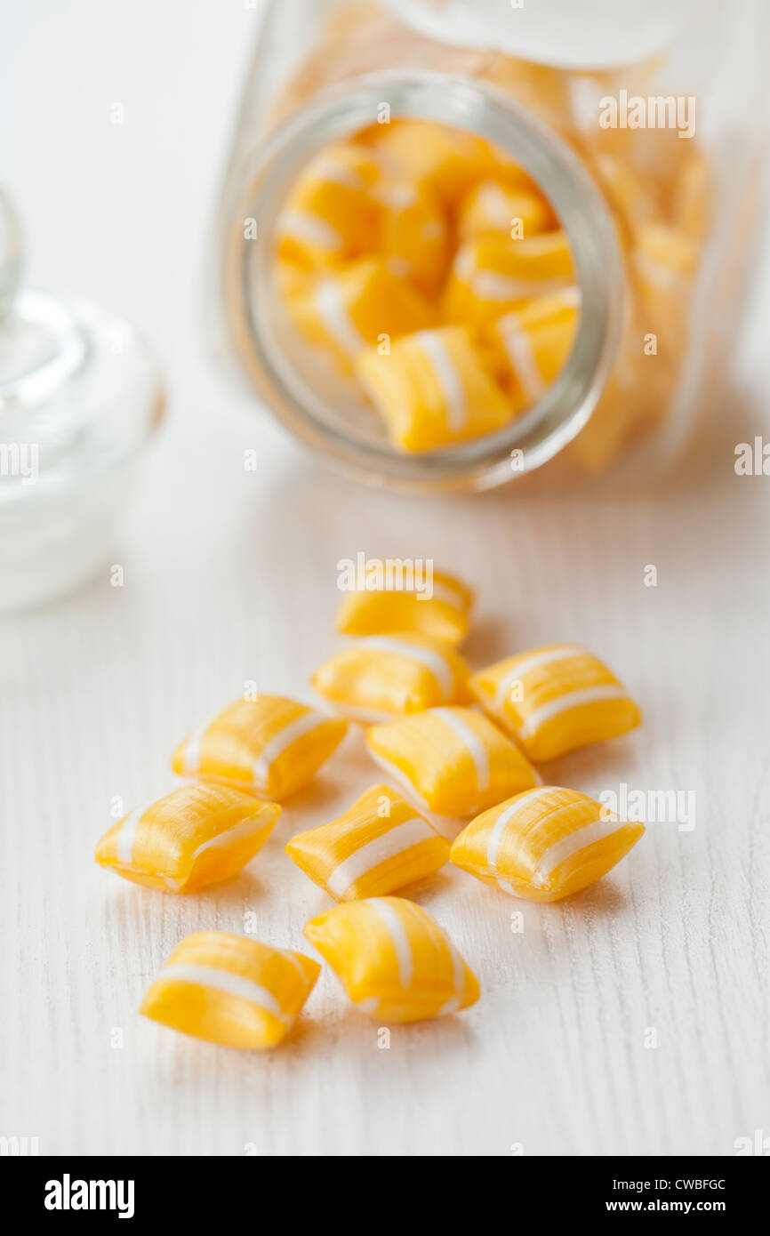 Close-up of hard yellow candy with white stripes Stock Photo - Alamy