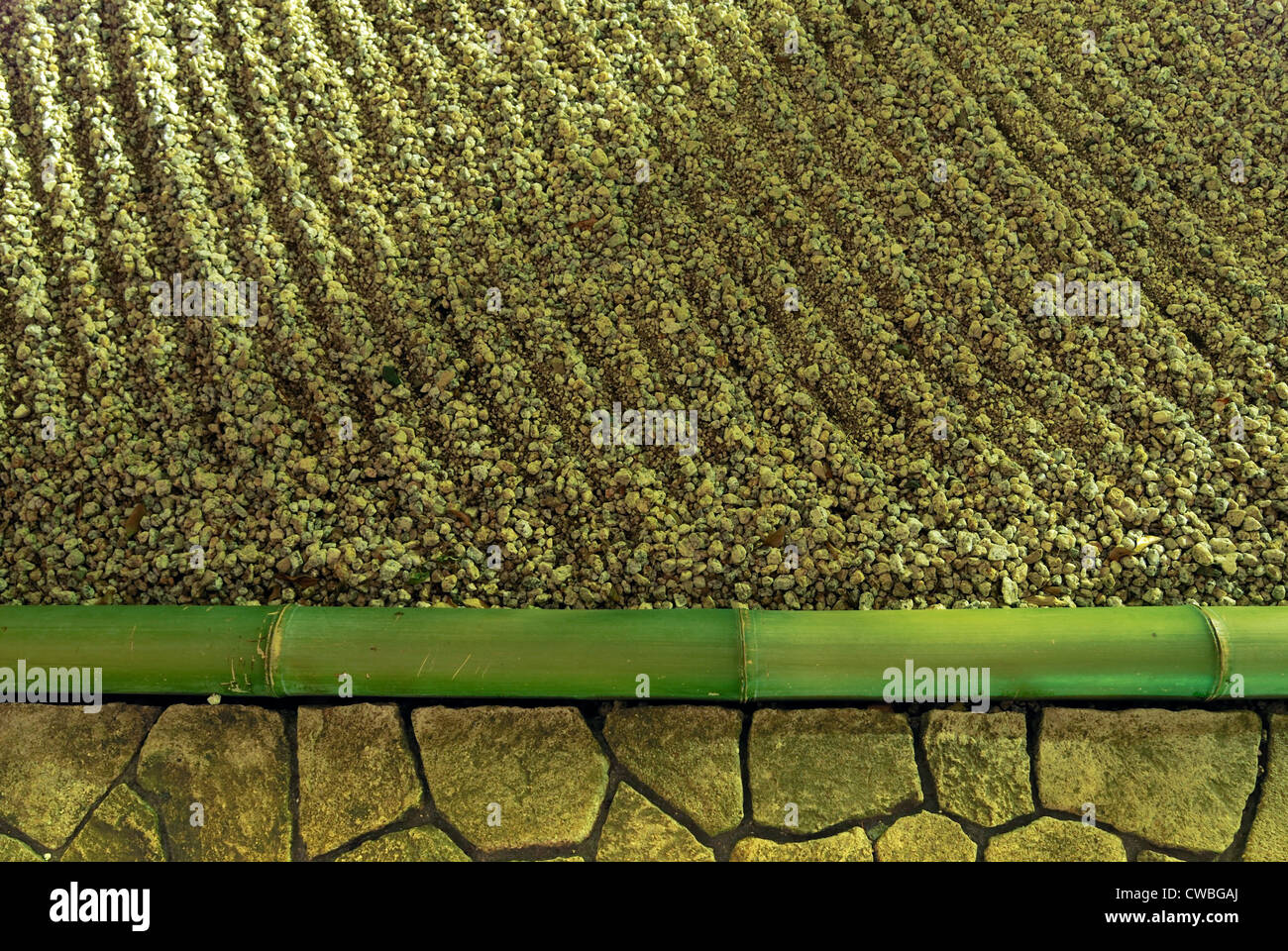 zen stone garden fragment under vivid night illumination with sand ...