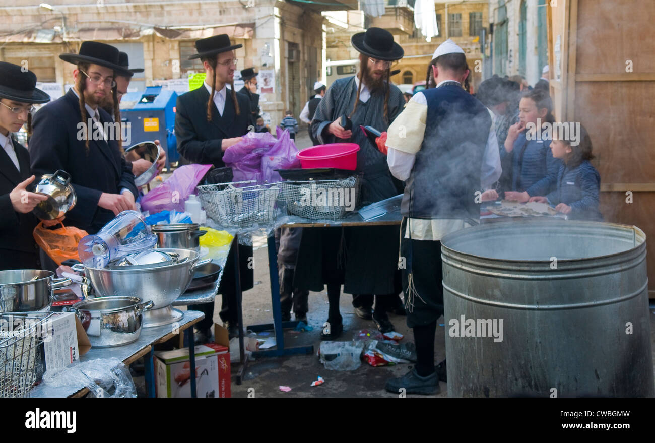 An Ultra Orthodox man is preparing to the Jewish holiday of Passover by ...
