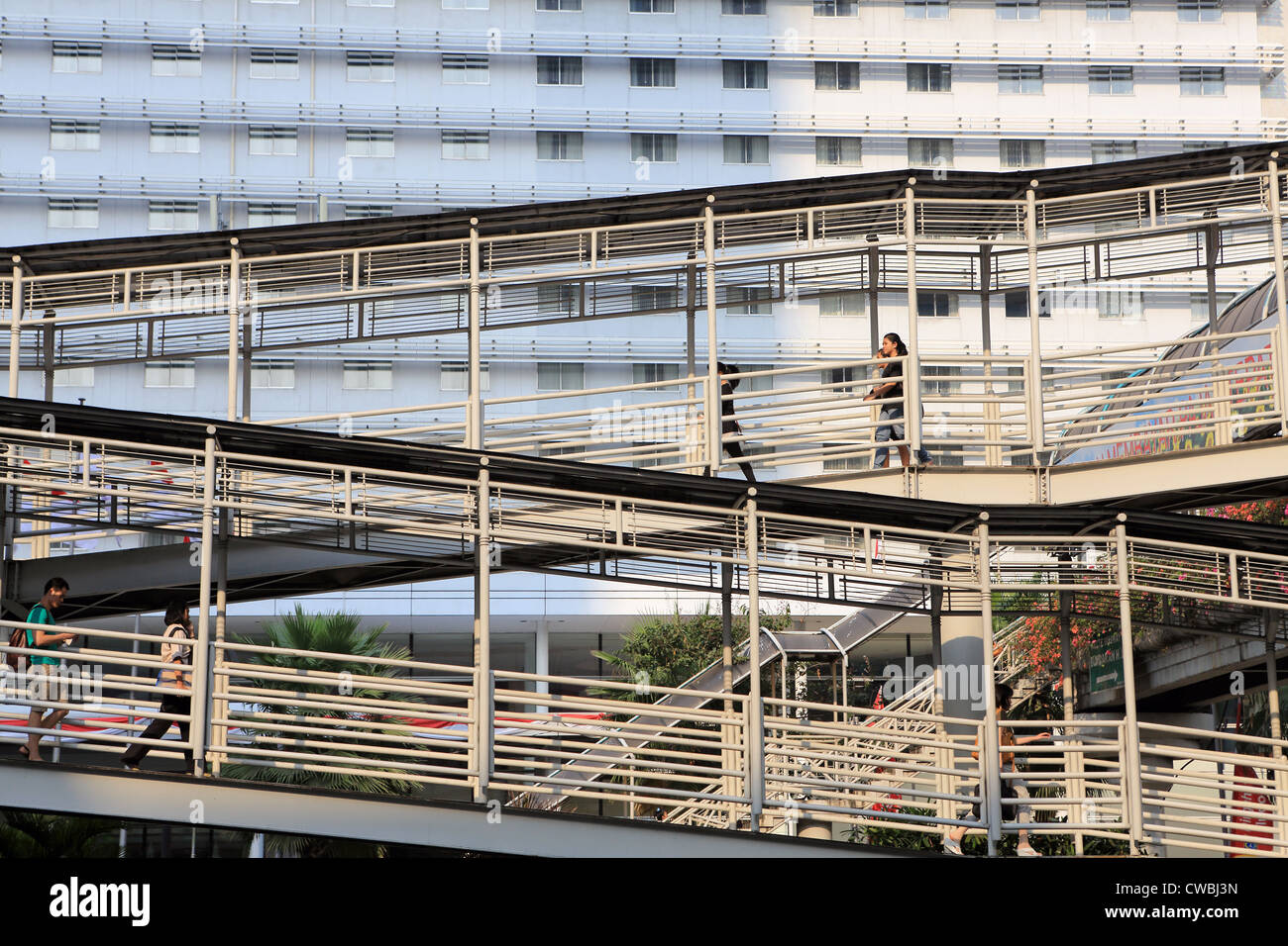 Pedestrians on walkway overpass over Jalan Thamrin in Jakarta Stock ...