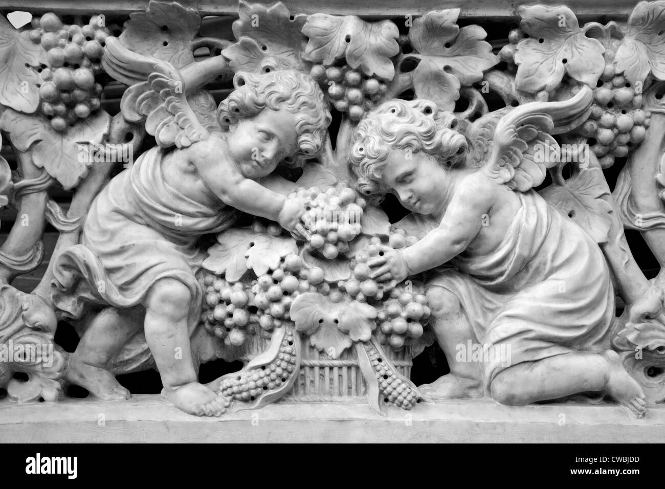 GENT - JUNE 23: Relief of engels with the grape. Detail from altar from ...