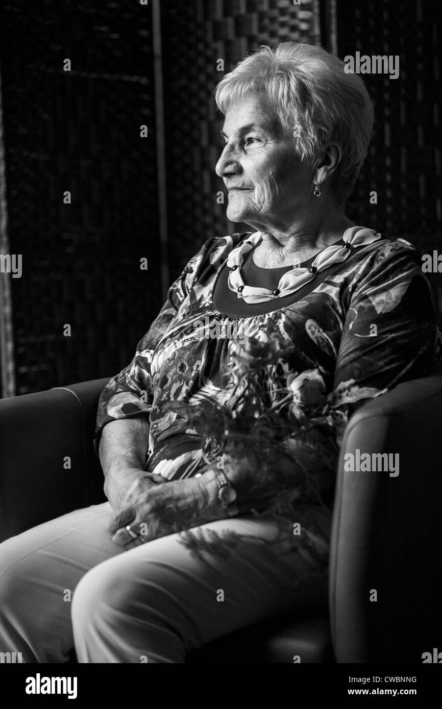 Portrait senior lady sitting Black and White Stock Photos & Images - Alamy
