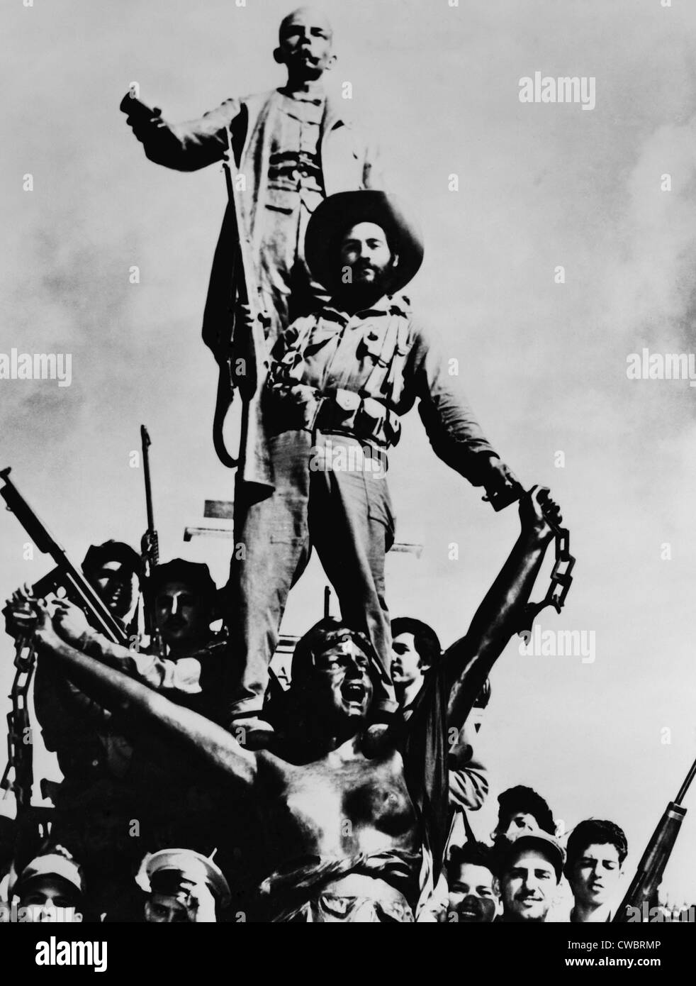 Cuban Revolutionary soldiers celebrating victory on a monument in ...