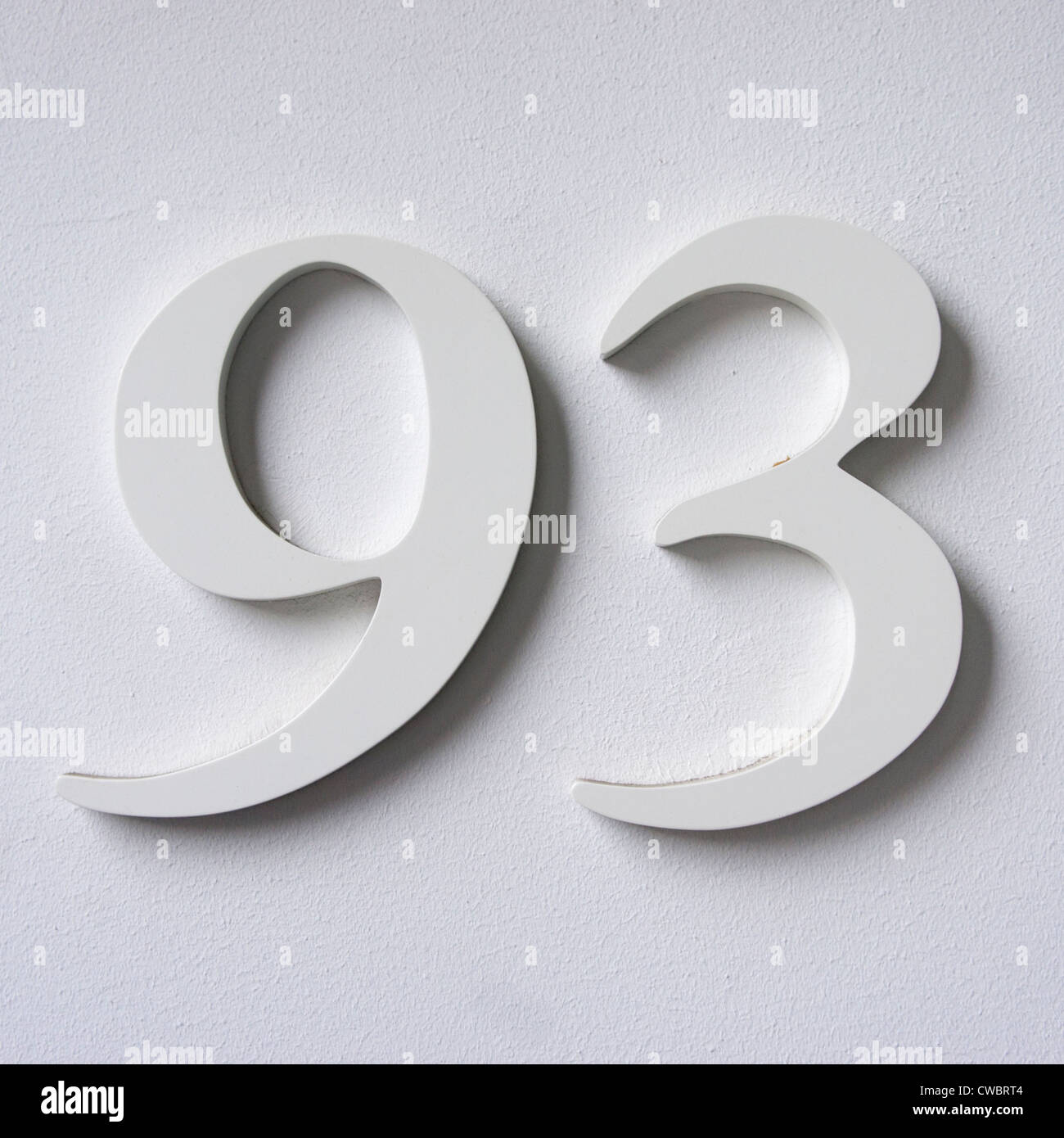 three dimensional house number ninety three white lettering on a white ...