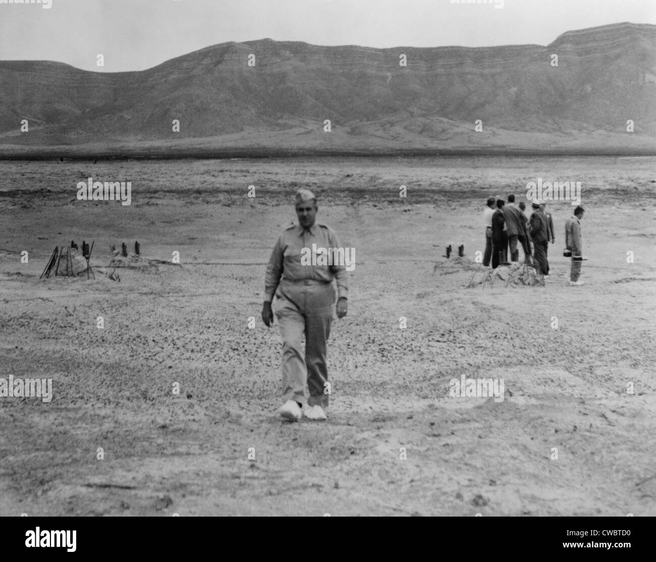 General Leslie Groves (1896-1970), walking across the site of the first ...