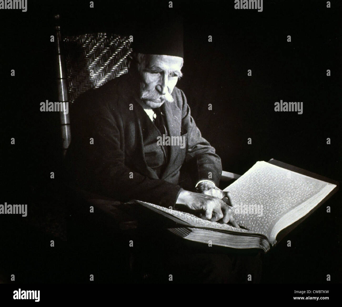 Blind man reading a Braille book, ca. 1938 Stock Photo - Alamy